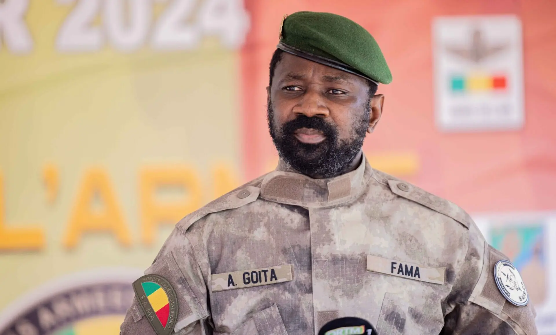 Mali's junta leader signs extended transition mandate | APAnews ...